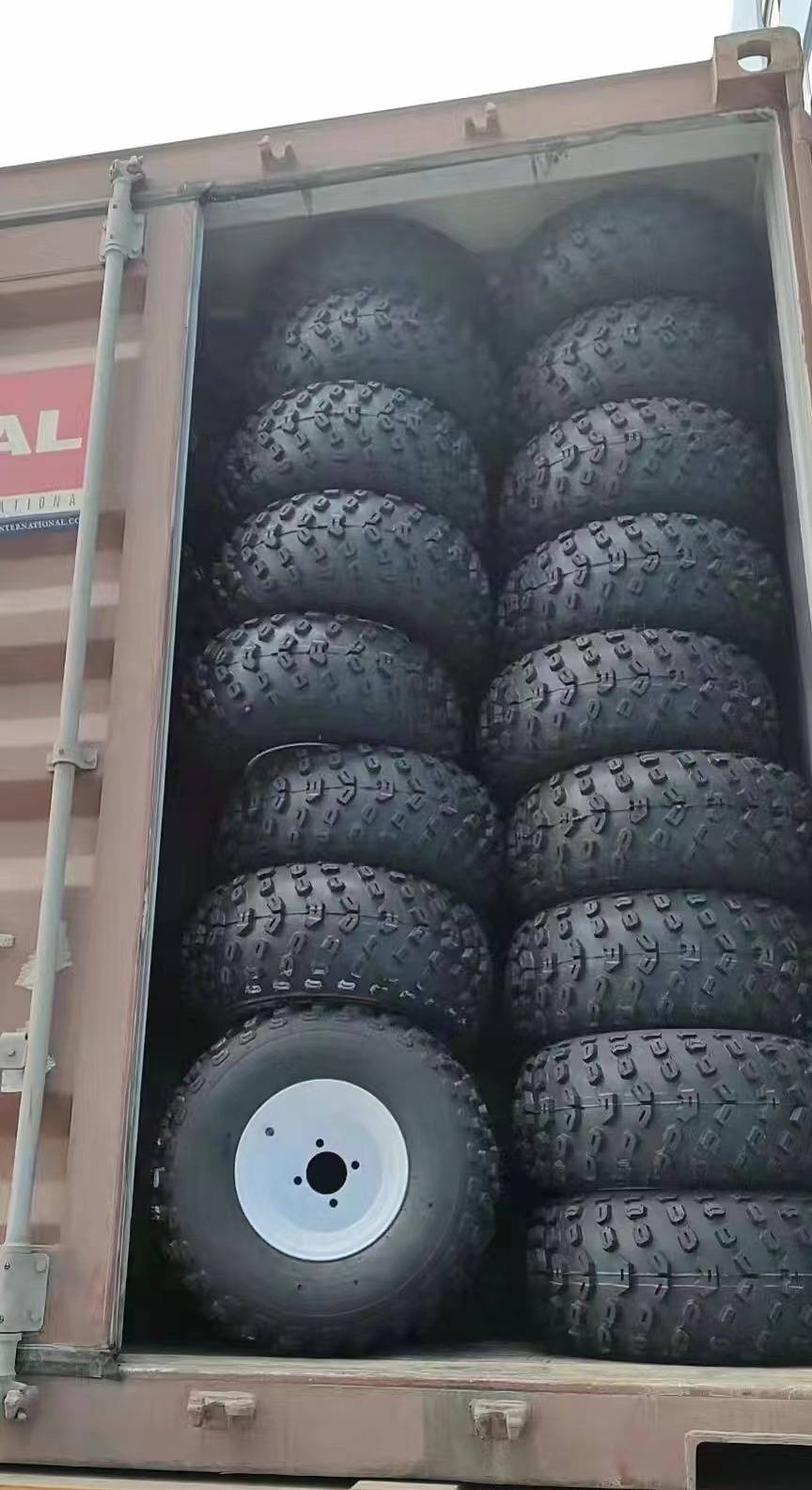 The tires + wheels are assembled into the container