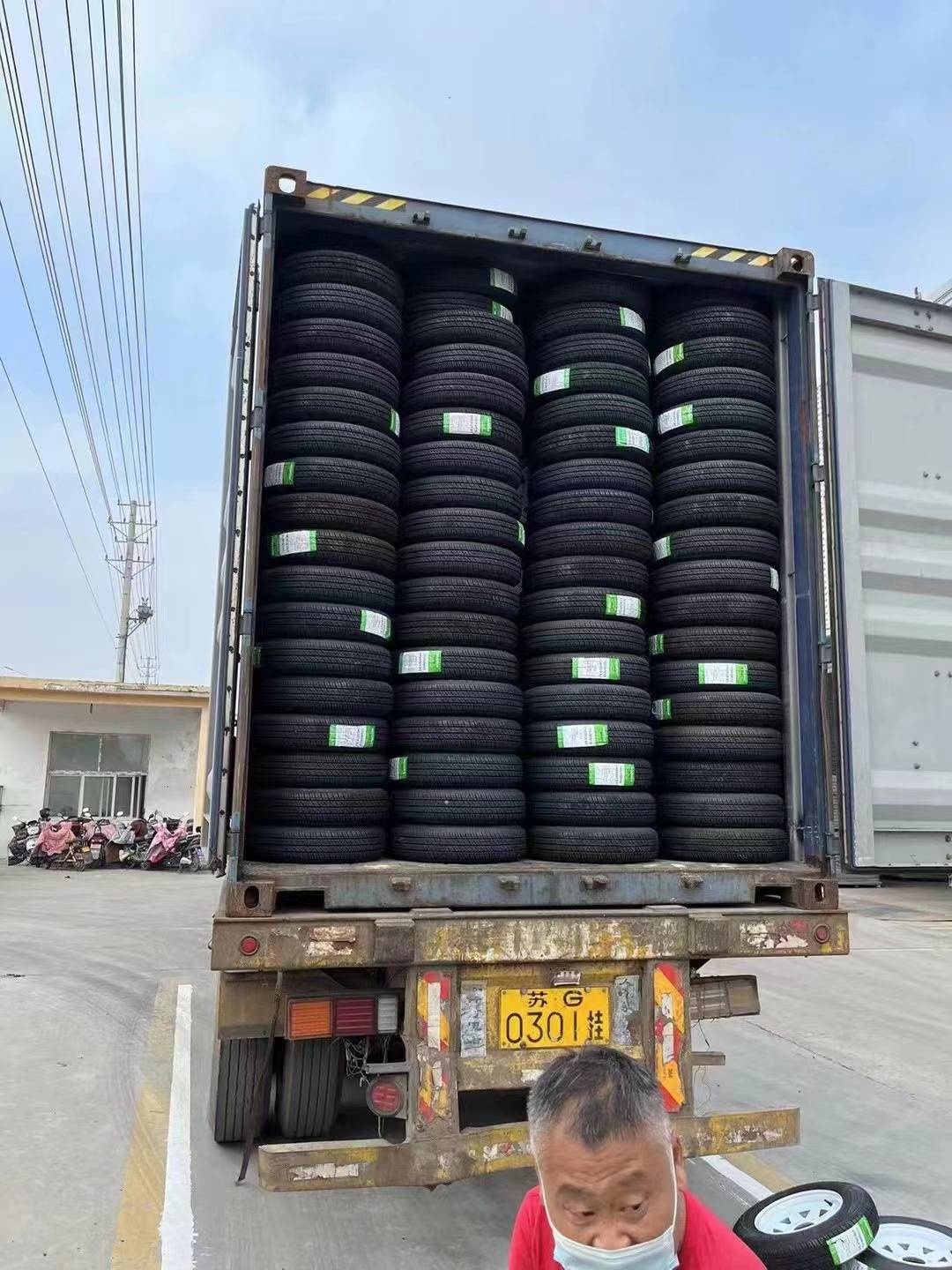 The tires + wheels are assembled into the container